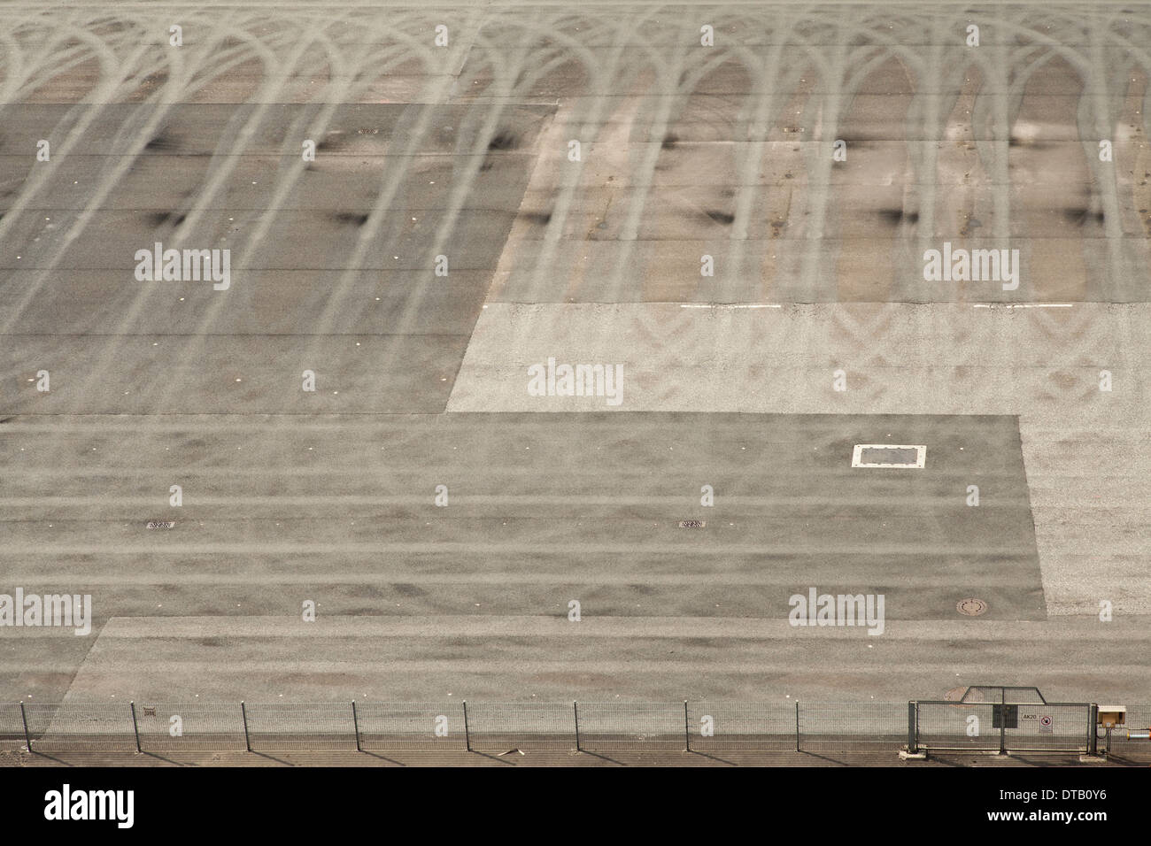 Tire tracks making a pattern on a sports track Stock Photo - Alamy