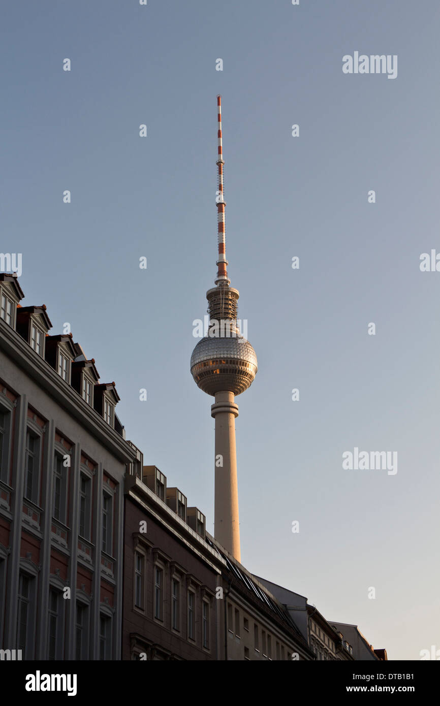 Alexanderplatz Television Tower, behind apartment buildings, Berlin, Germany Stock Photo - Alamy