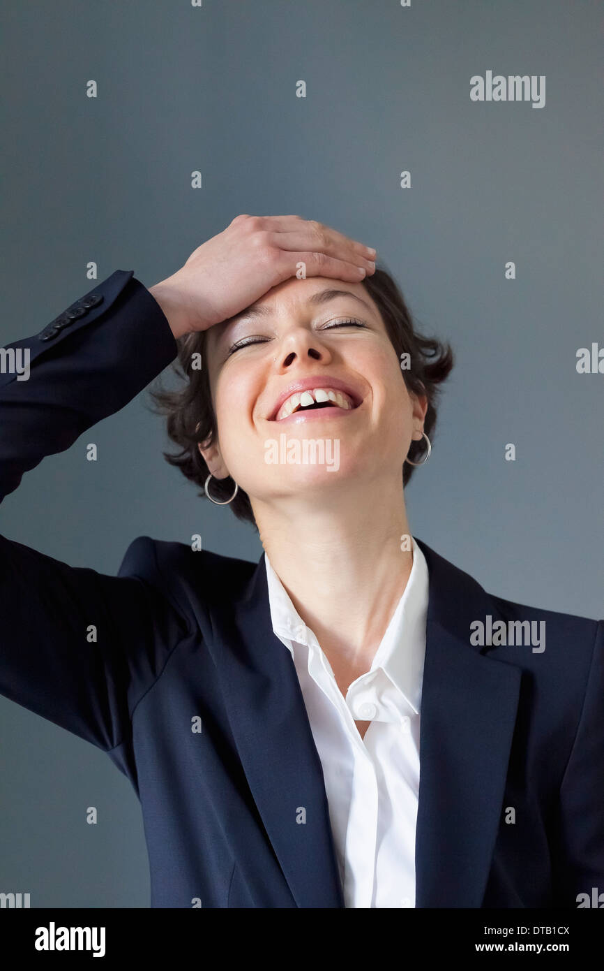 A smiling mid adult woman having an aha moment, close-up Stock Photo ...