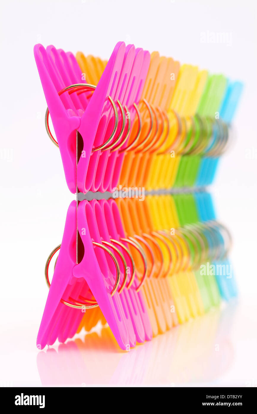 Colorful plastic clothespin on a white background Stock Photo - Alamy