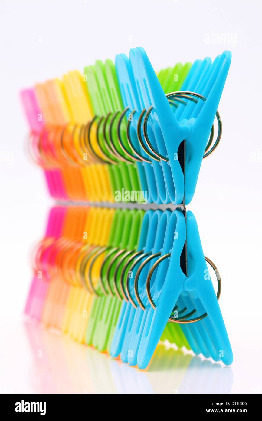 Colorful plastic clothespin on a white background Stock Photo - Alamy