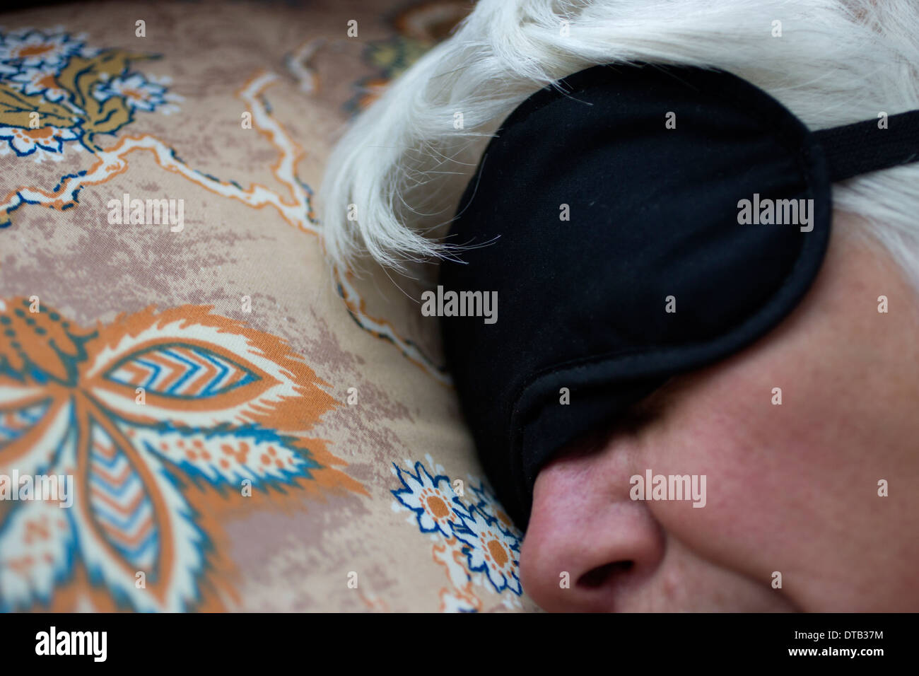 Woman sleeping mask hi-res stock photography and images - Alamy