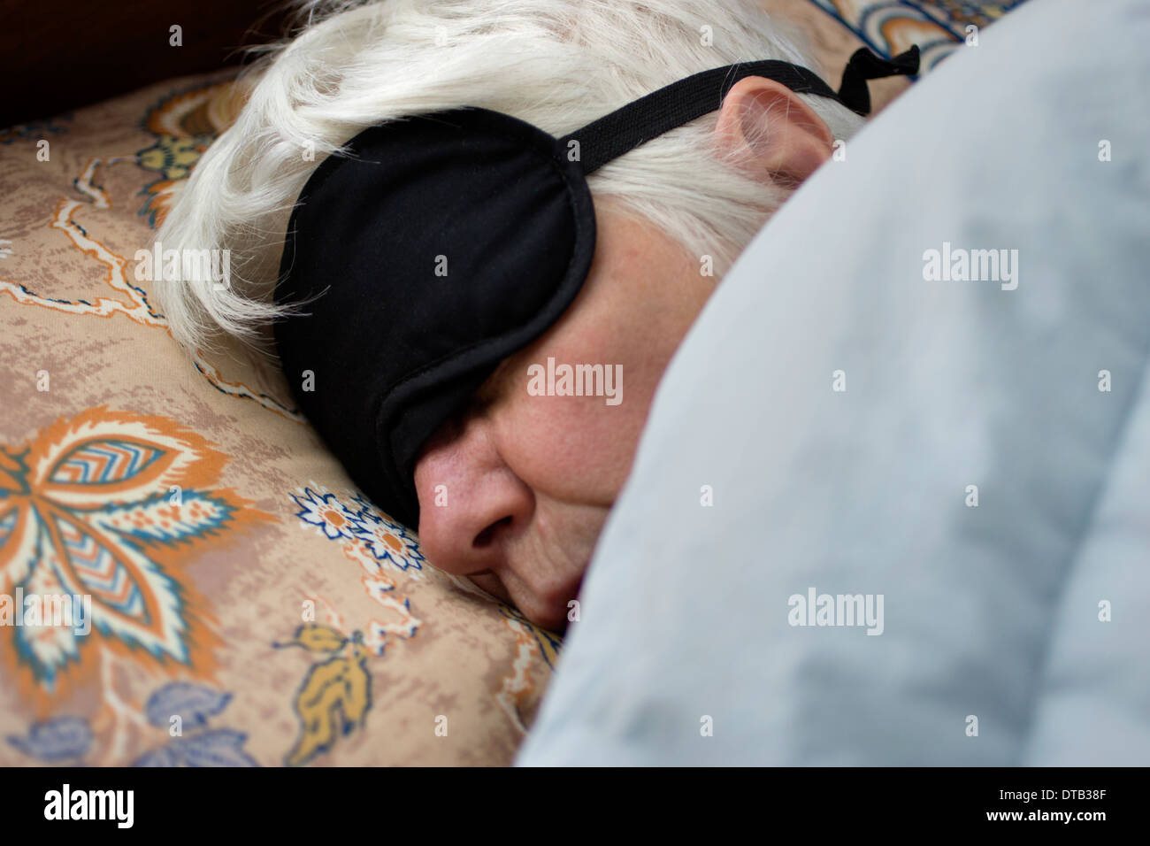 Woman sleeping mask hi-res stock photography and images - Alamy