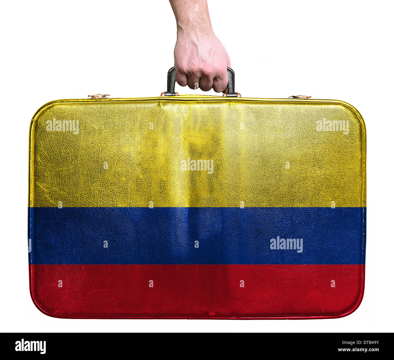Tourist hand holding vintage leather travel bag with flag of Colombia ...
