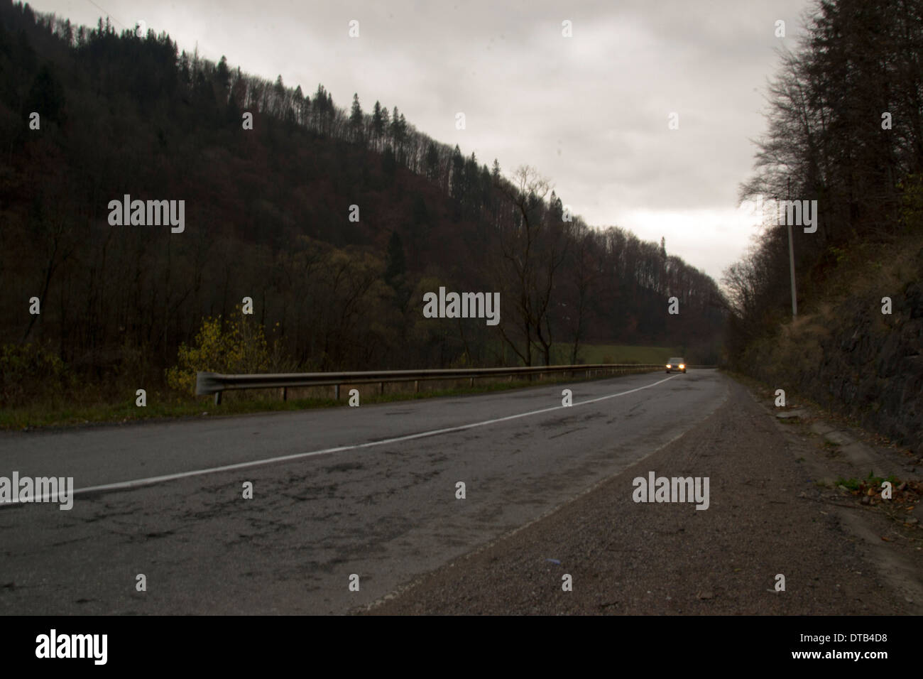 Car driving at night on a dark road hi-res stock photography and images ...