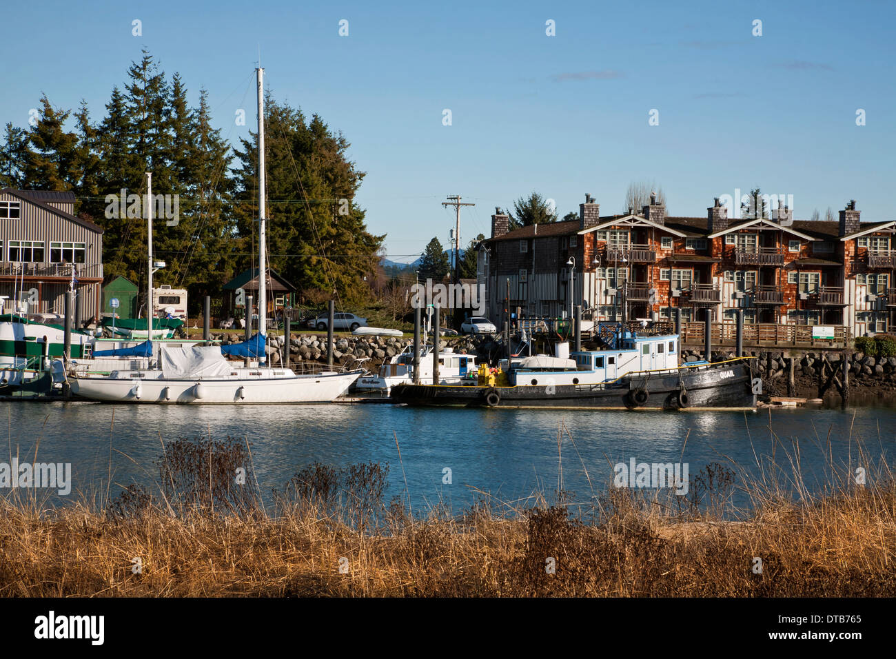 WASHINGTON - Boats docked along the Swinomish Channel at the town of La ...