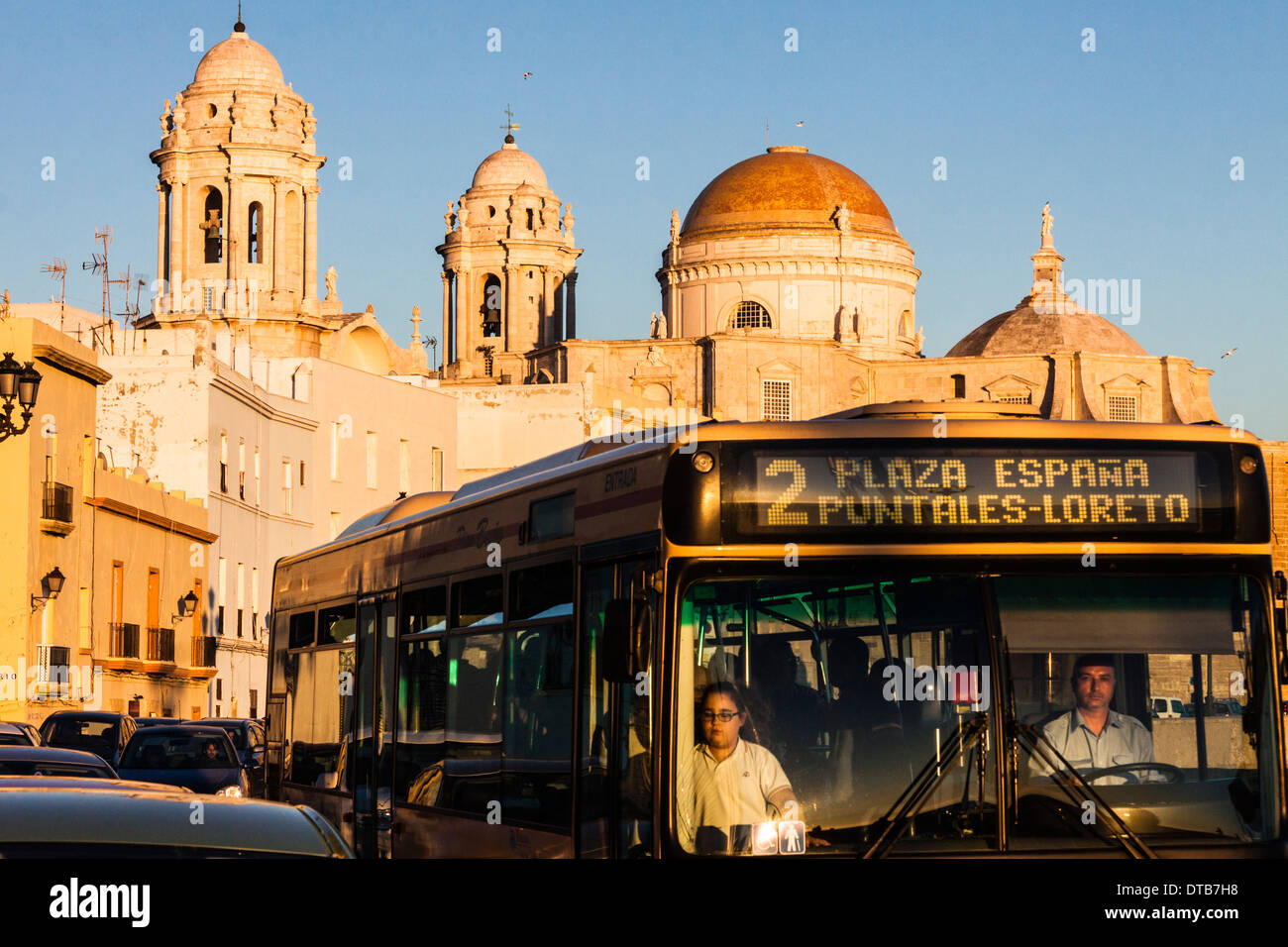Public bus with cathedral in background. Cadiz, Andalusia, Spain Stock ...