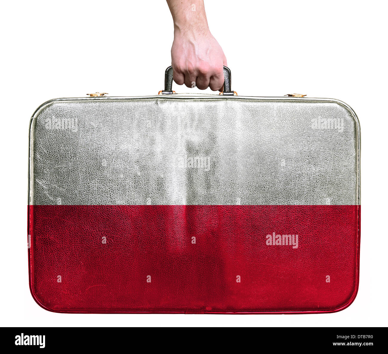 Tourist hand holding vintage leather travel bag with flag of Poland ...