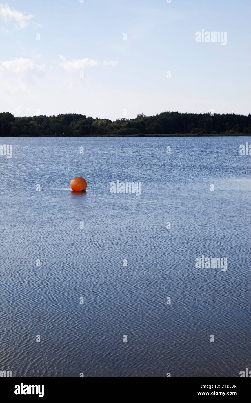 Ball floating on river water surface, Husum, Germany Stock Photo - Alamy