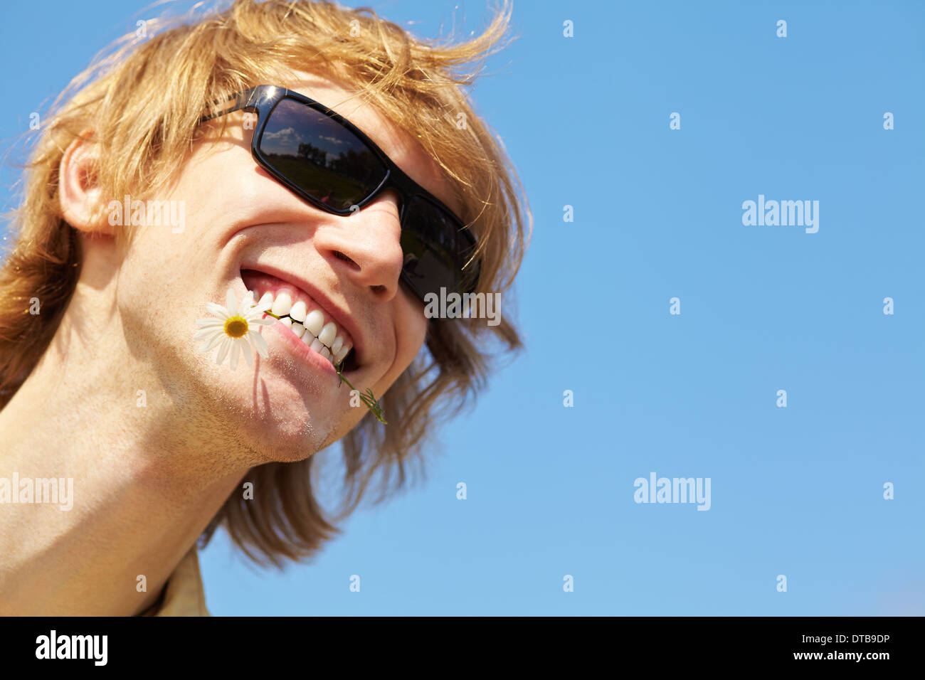 Man flower teeth hi-res stock photography and images - Alamy
