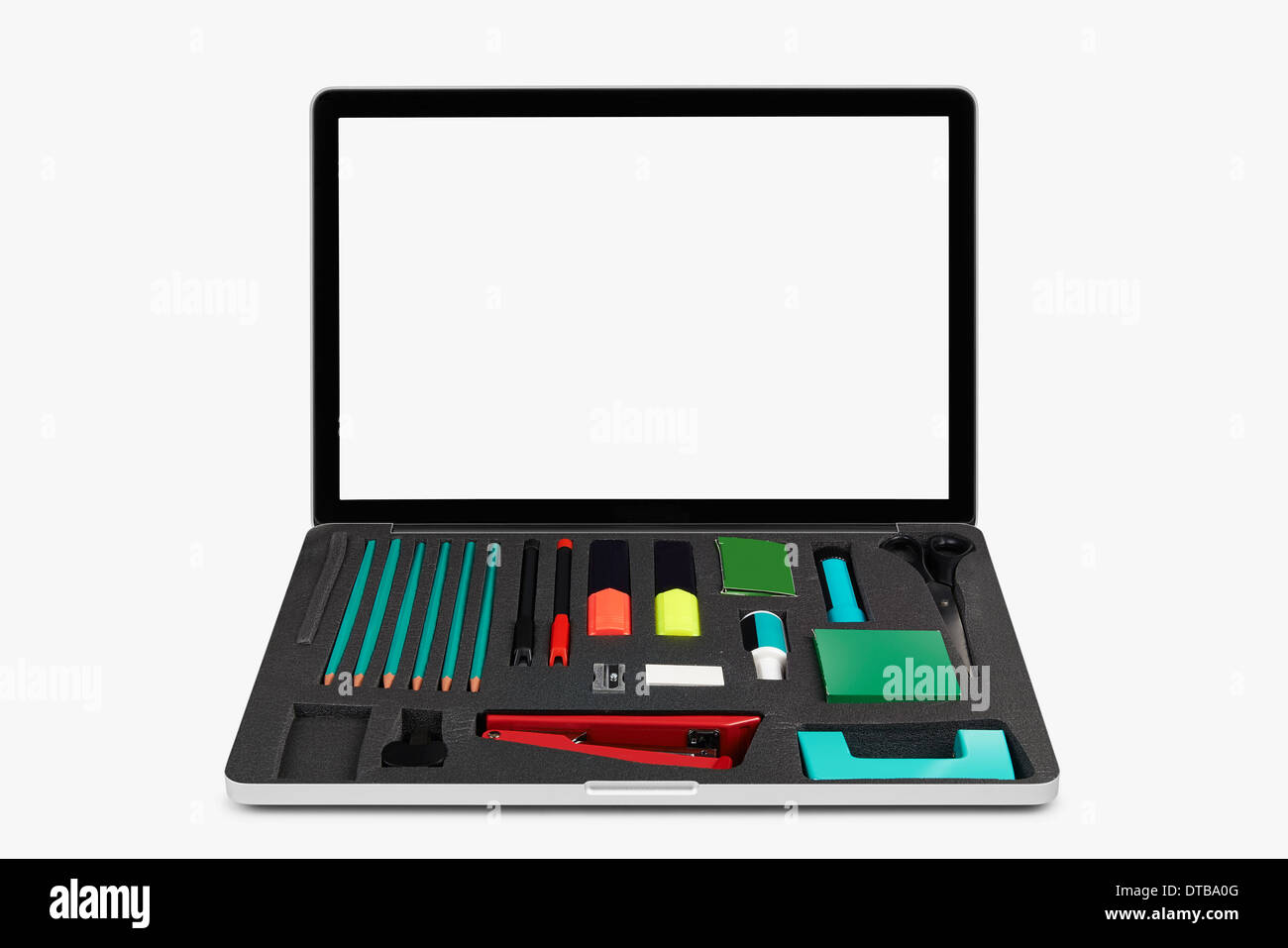 Laptop isolated on white with office tools as keyboard, clipping path ...
