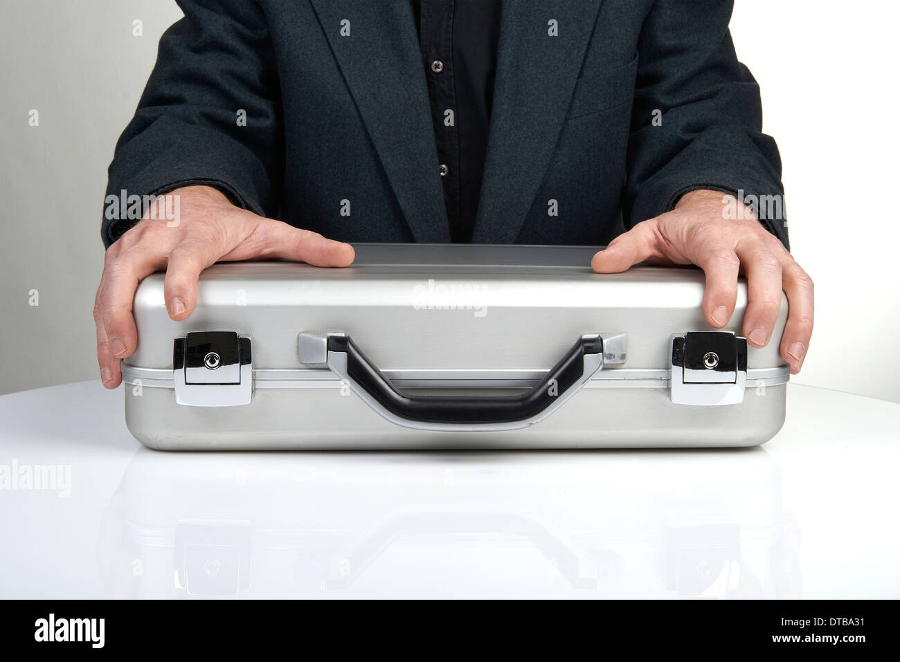 Businessman hand holding briefcase hi-res stock photography and images ...