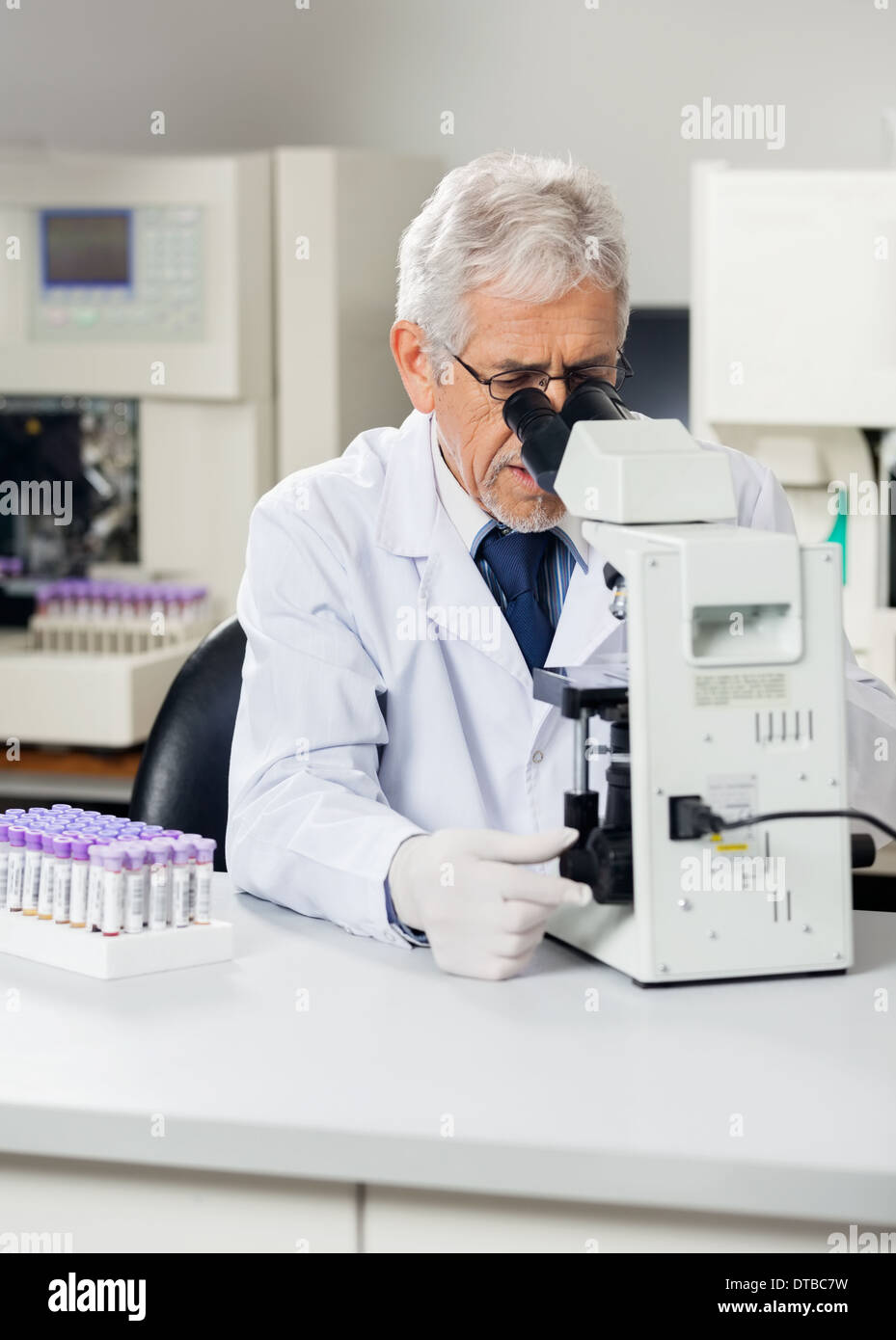 Scientist using microscope in lab hi-res stock photography and images ...