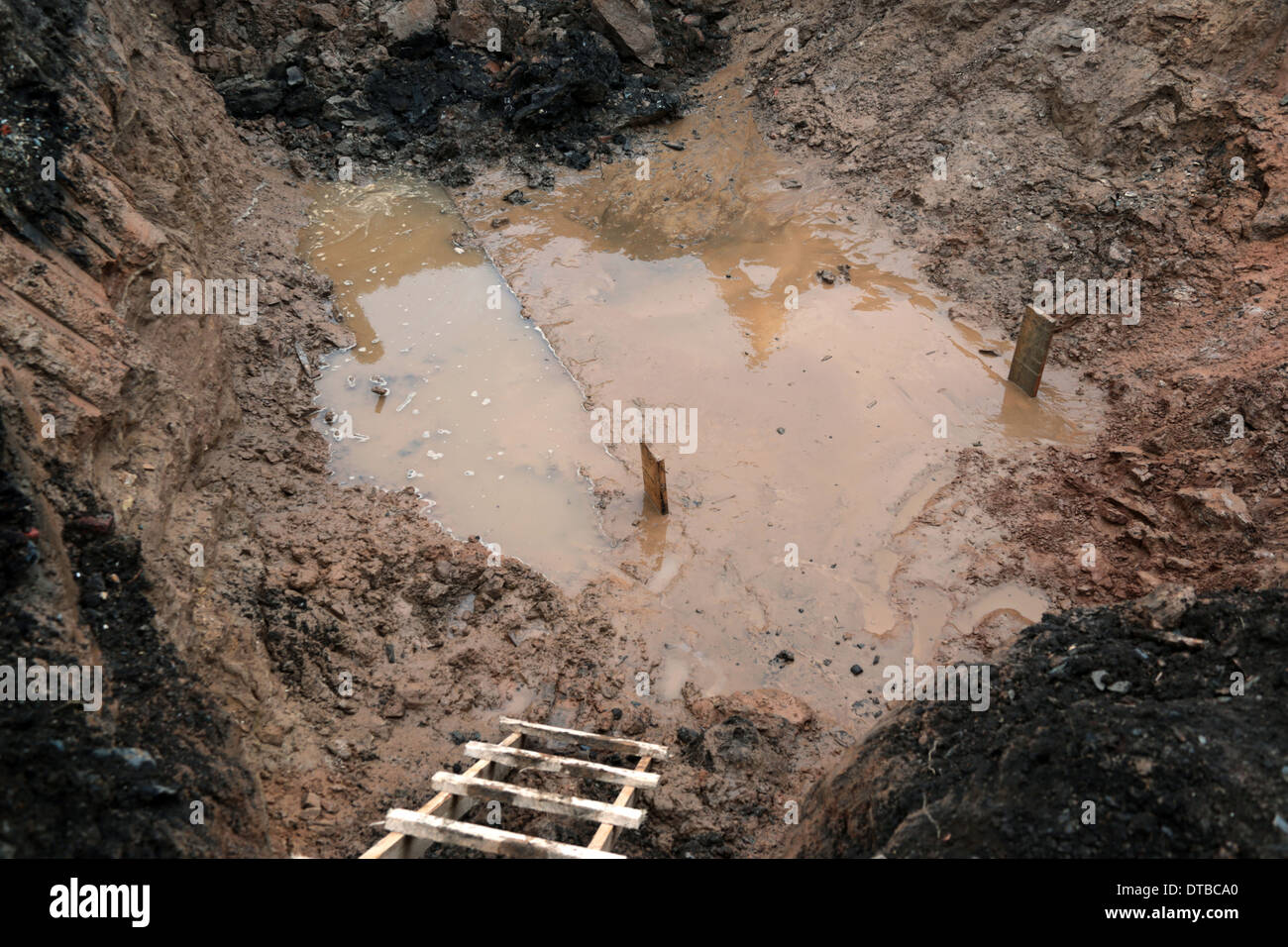 construction pit filled with water Stock Photo - Alamy