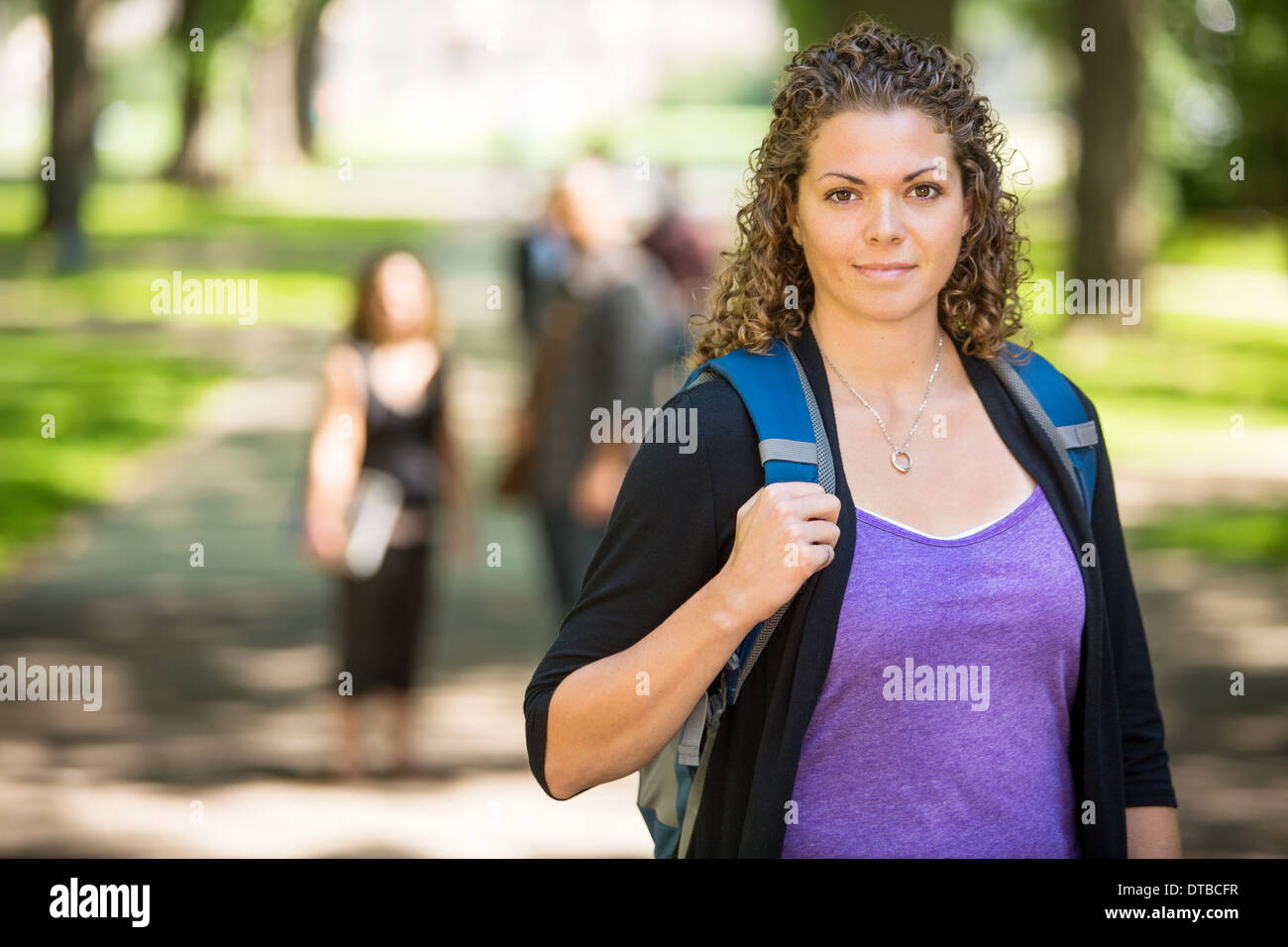 Confident Female Student Standing At Campus Stock Photo - Alamy