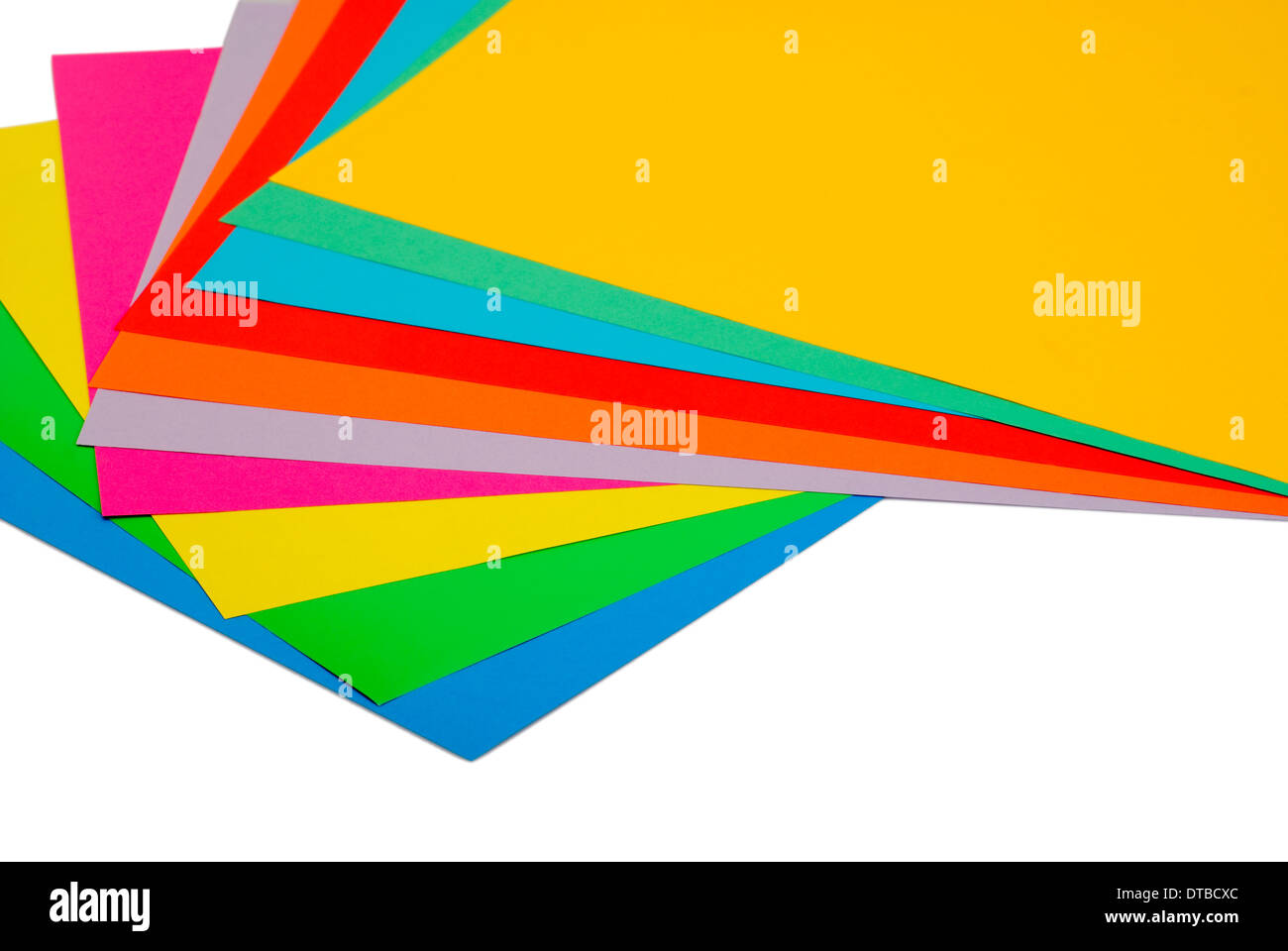 various color paper stack like a rainbow isolated on white Stock Photo ...