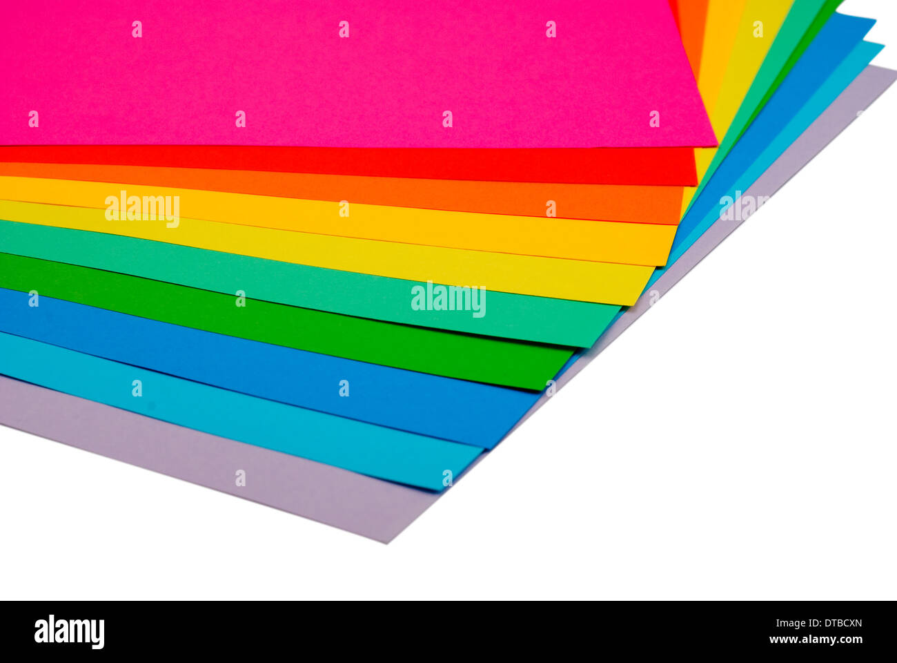 various color paper stack like a rainbow isolated on white Stock Photo ...