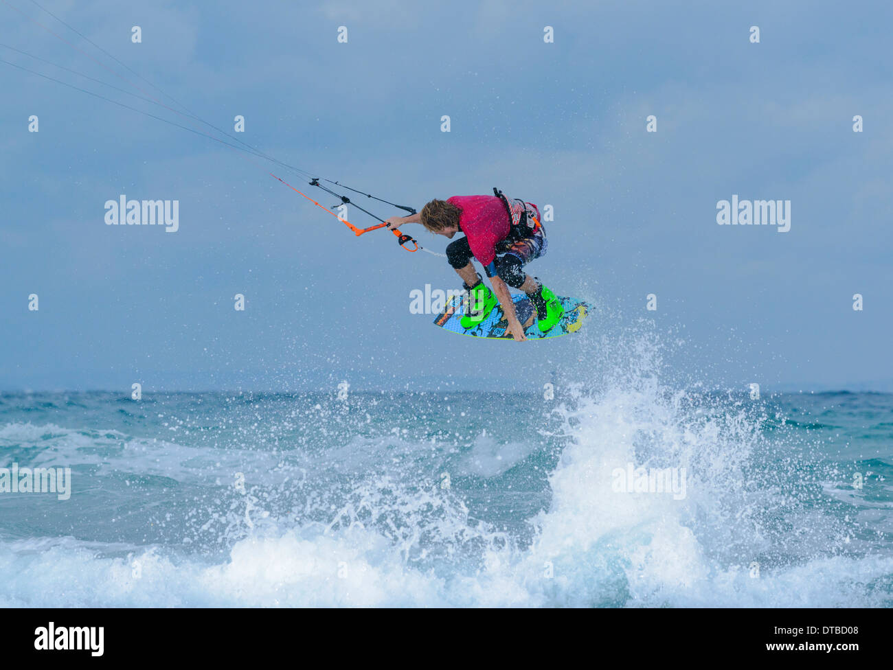 Kitesurfer jumping a wave Stock Photo - Alamy
