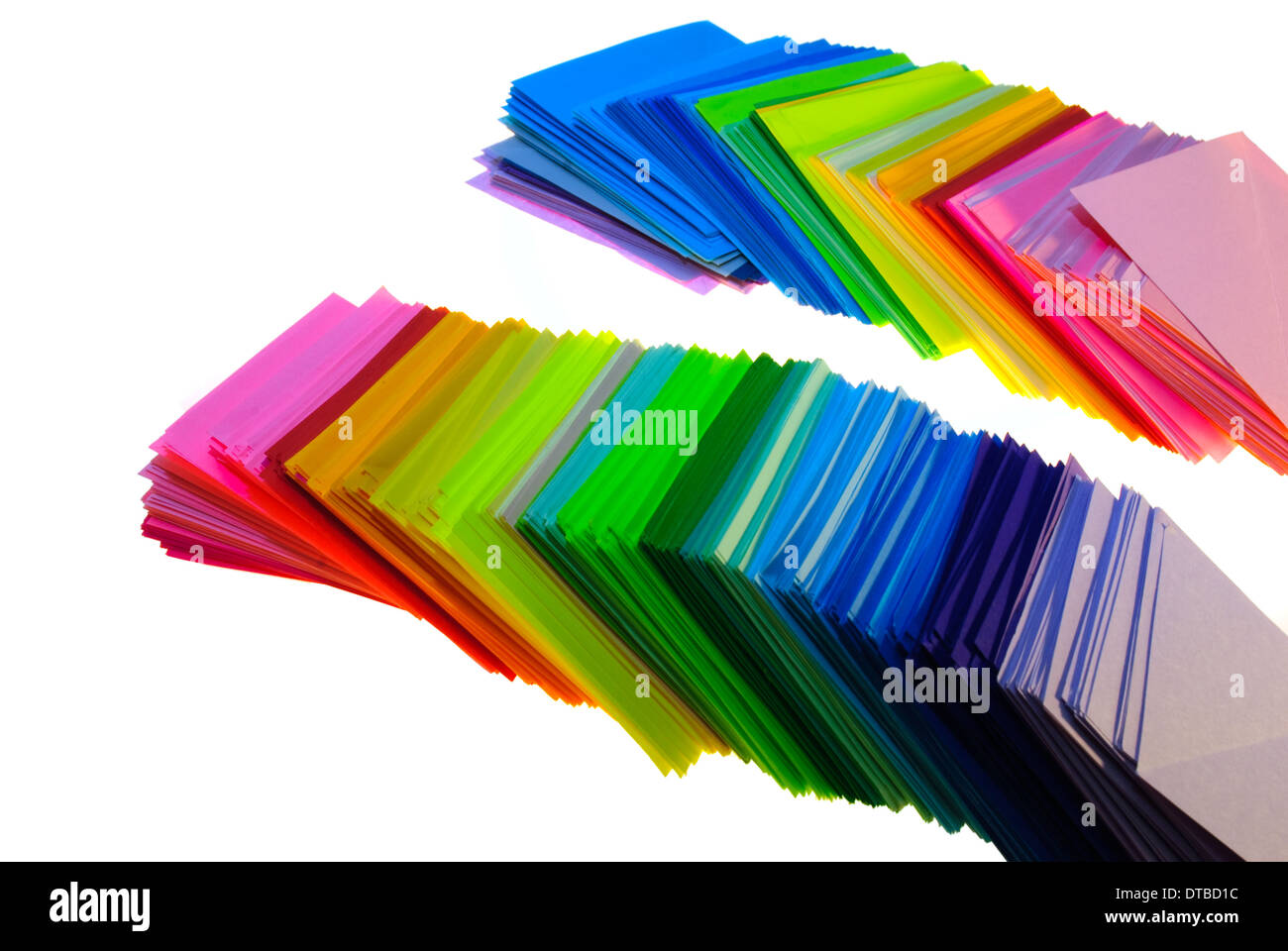 various color paper stack like a rainbow isolated on white Stock Photo ...