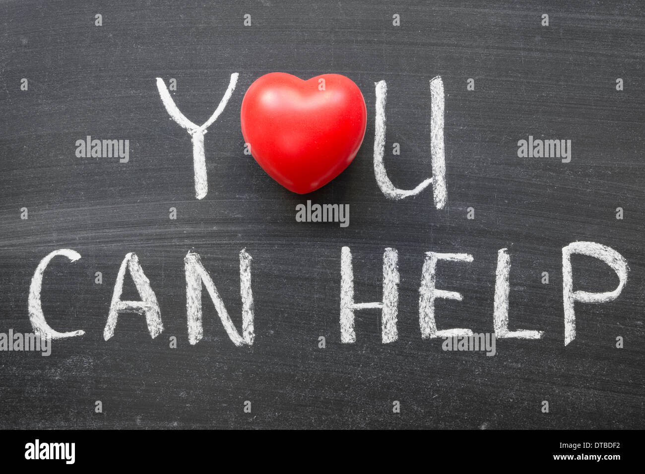 you can help phrase handwritten on school blackboard Stock Photo - Alamy