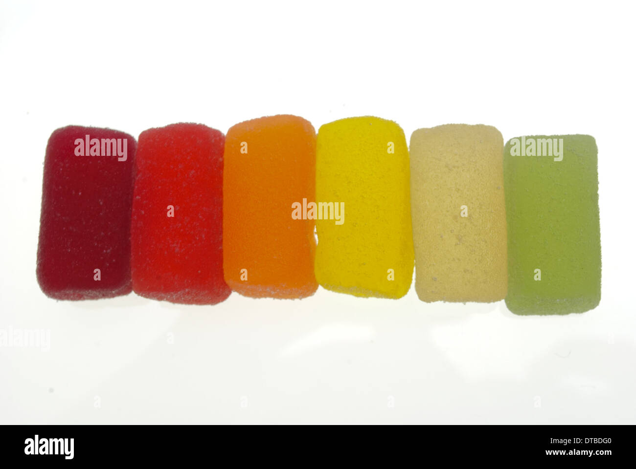 various fruit jelly brick isolated on white like a rainbow Stock Photo ...