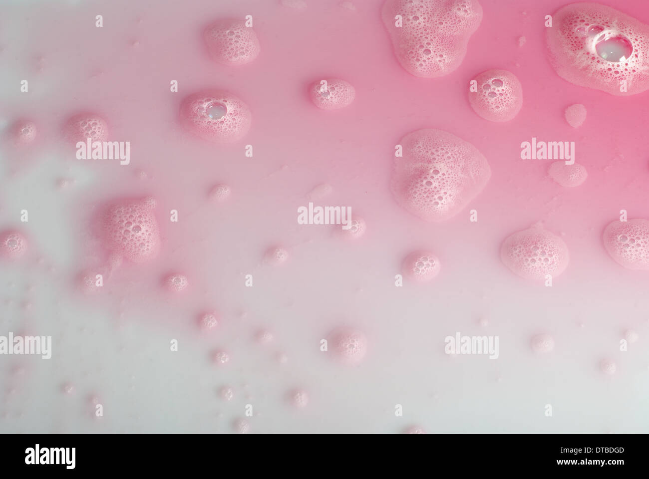 Romantic background from pink fluid and drops on white Stock Photo - Alamy