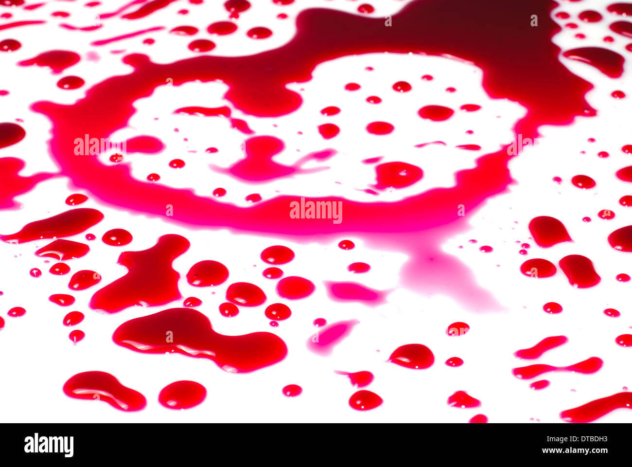 Heart shape from drops of red liquid isolated on white background Stock ...