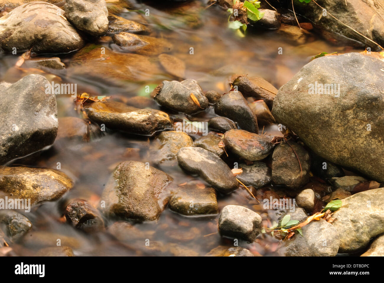 Big and small river's stones in mountain's stream Stock Photo - Alamy
