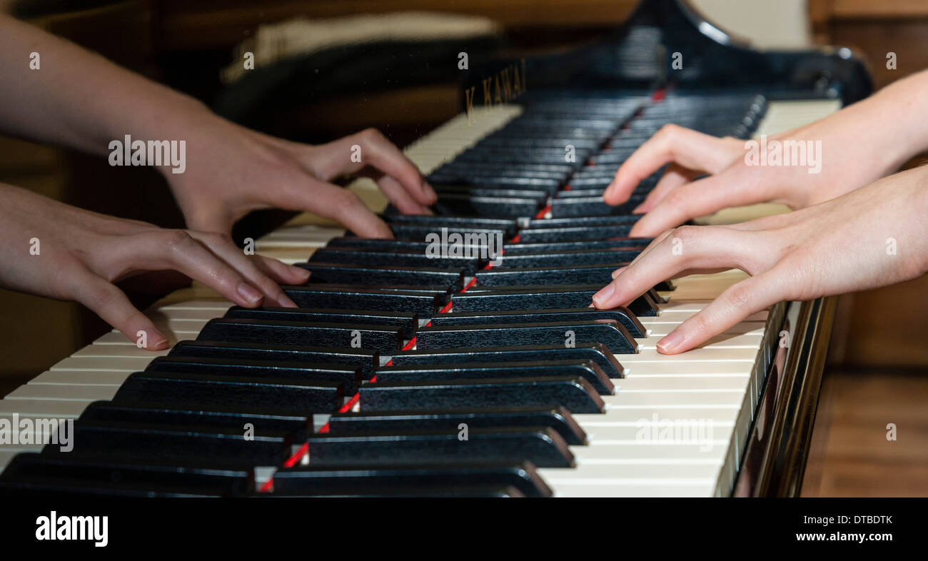 Play instrument hi-res stock photography and images - Alamy