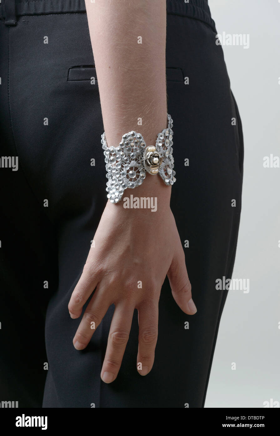 Hand wearing jewelry hi-res stock photography and images - Alamy