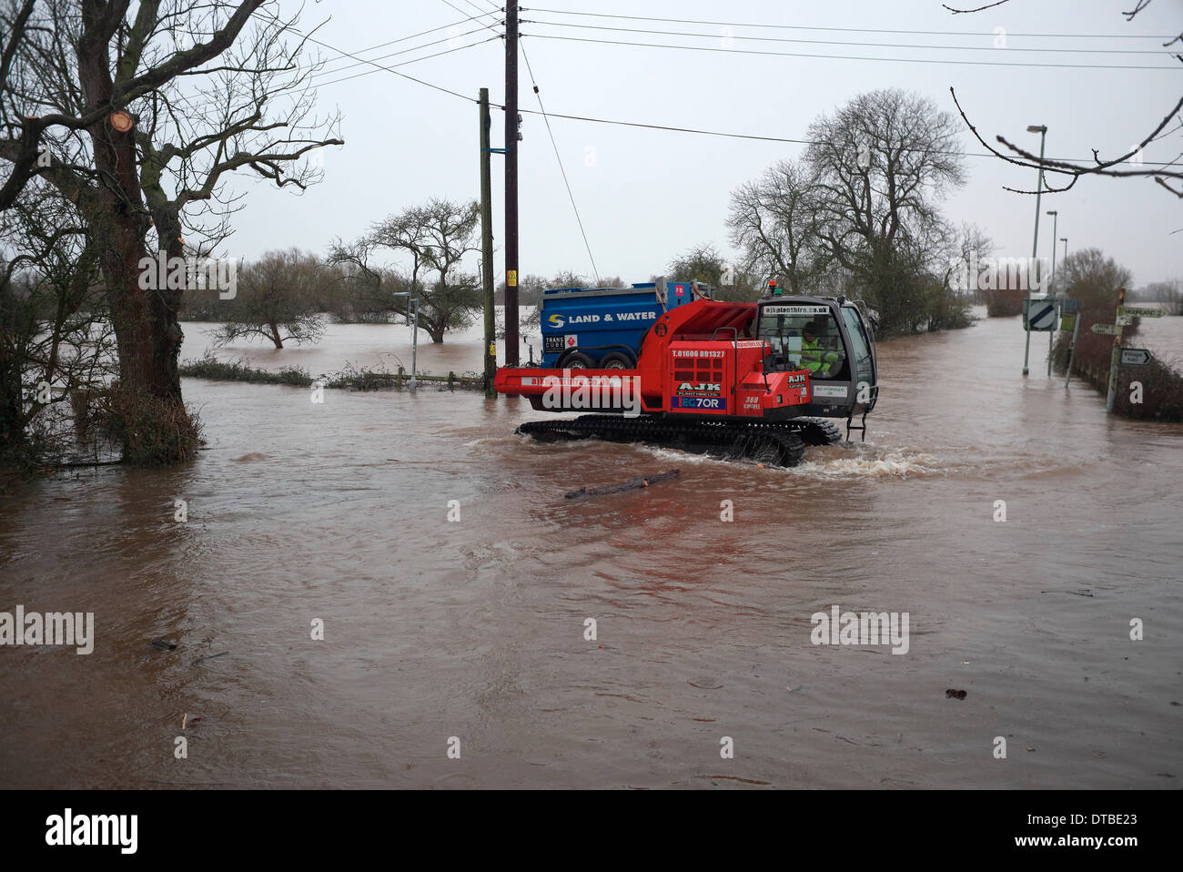 Burrowbridge, UK. 13th Feb, 2014. Environment Agency using tracked ...
