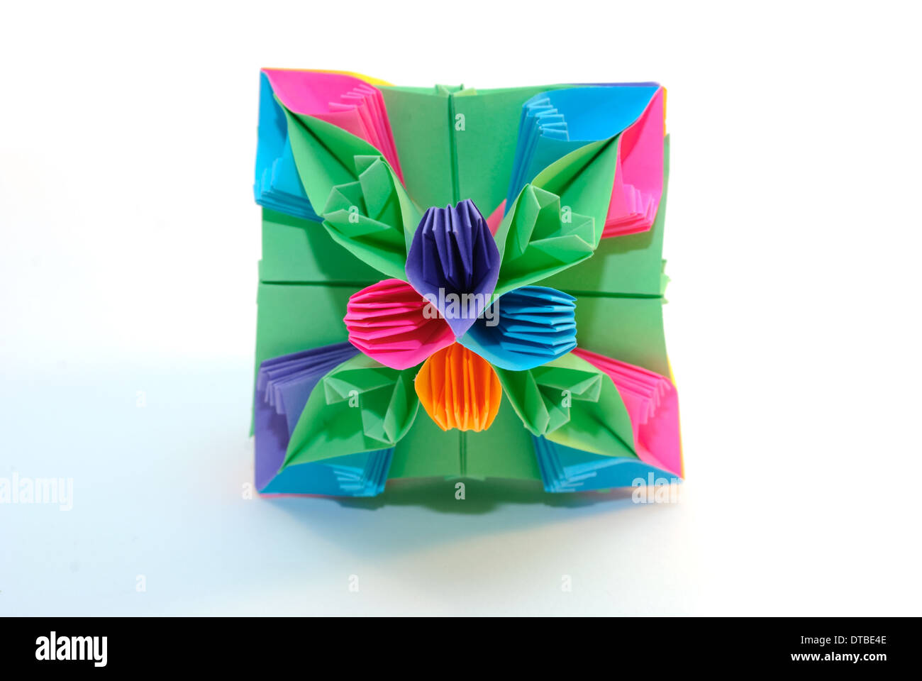 Colorfull origami unit "colorful cube flower" isolated on white ...