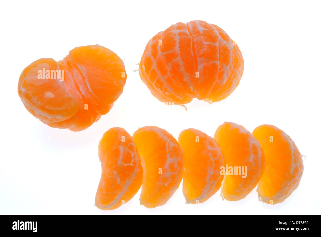 segments of a tangerine isolated on white background Stock Photo - Alamy
