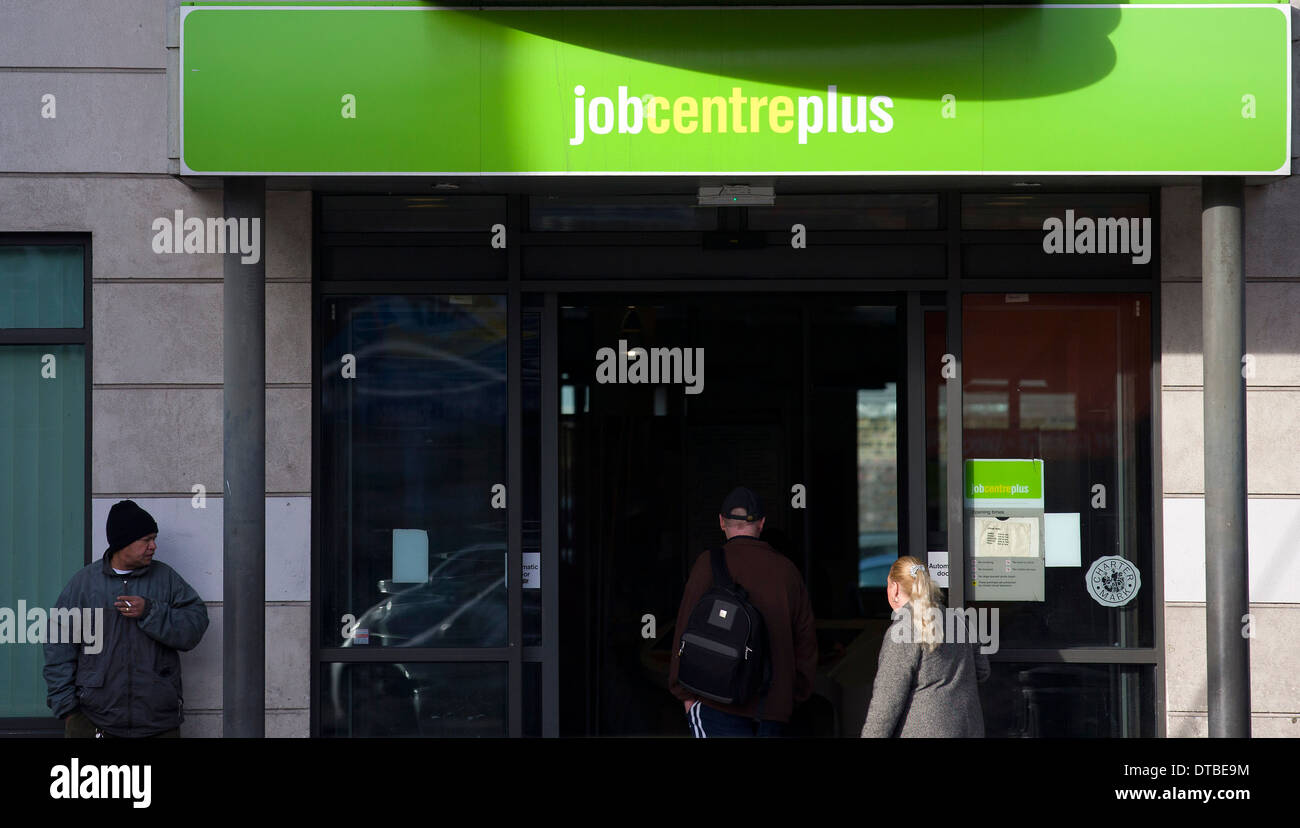 United Kingdom, London : A man stands outside a job centre plus in ...