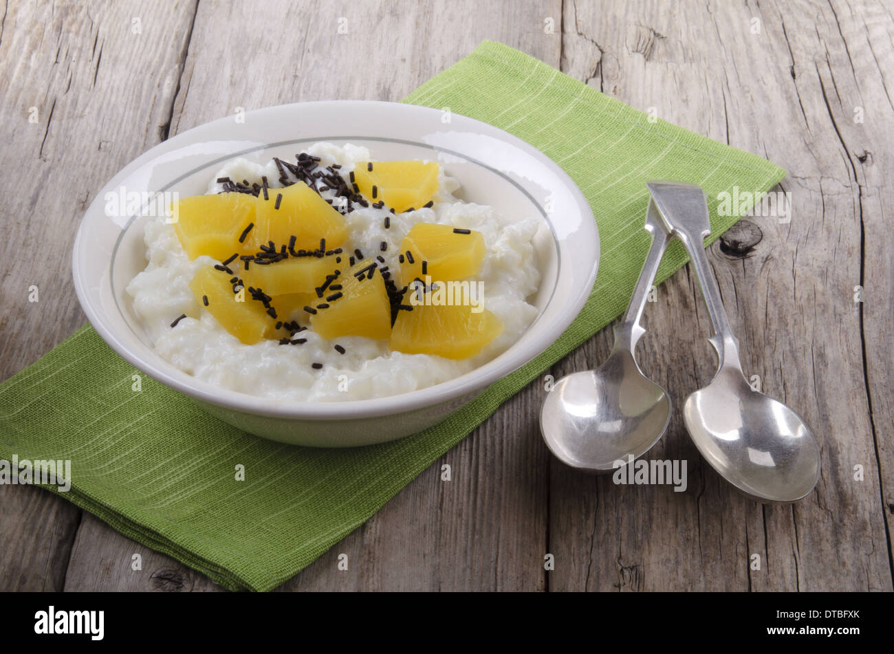 rice pudding with pineapple and chocolate sprinkle Stock Photo - Alamy