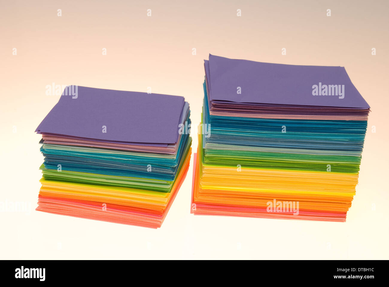 Various color shits of paper scattered on white background Stock Photo ...