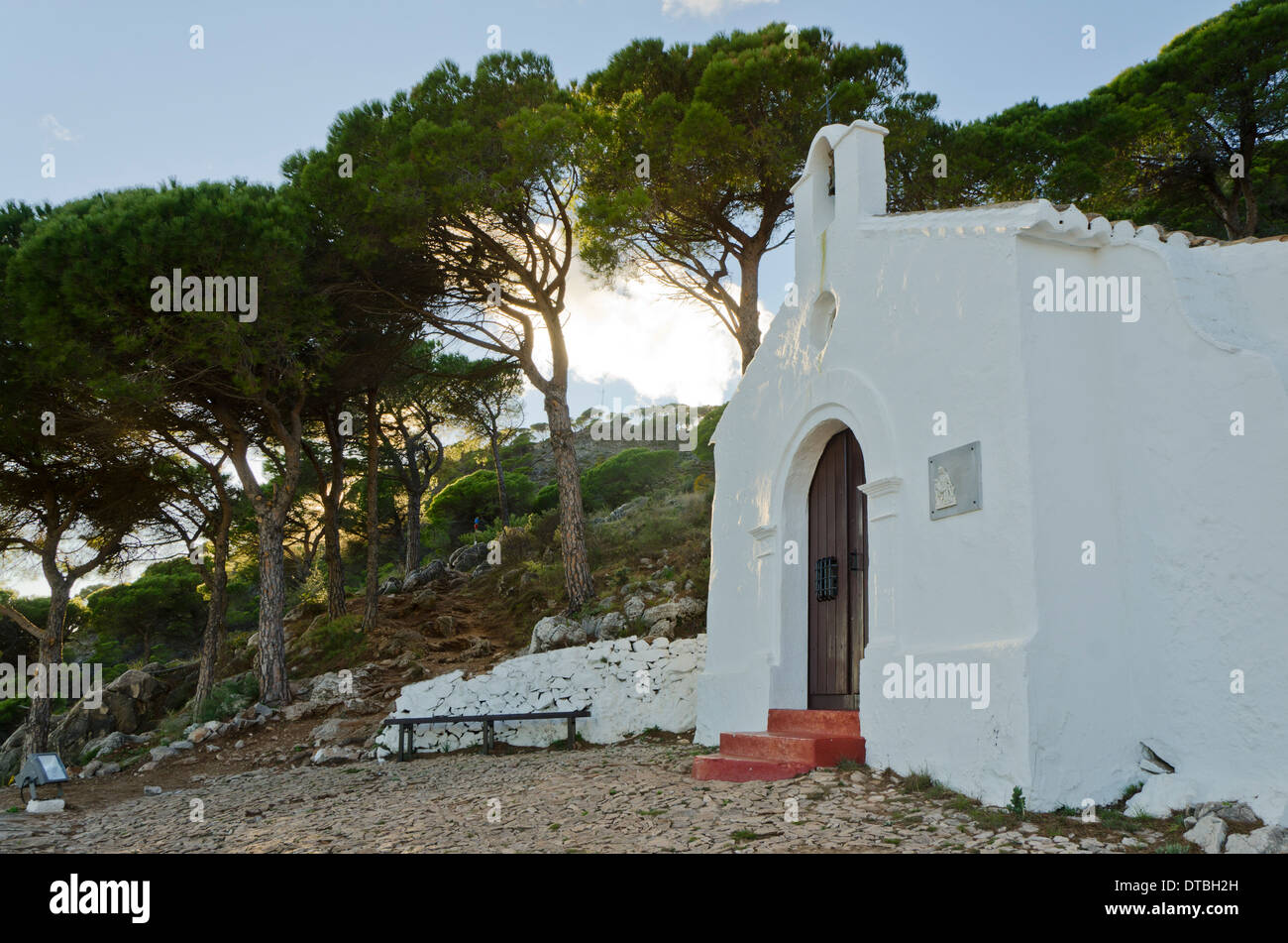 The small chapel of Ermita del Calvario. in the mountains of white ...
