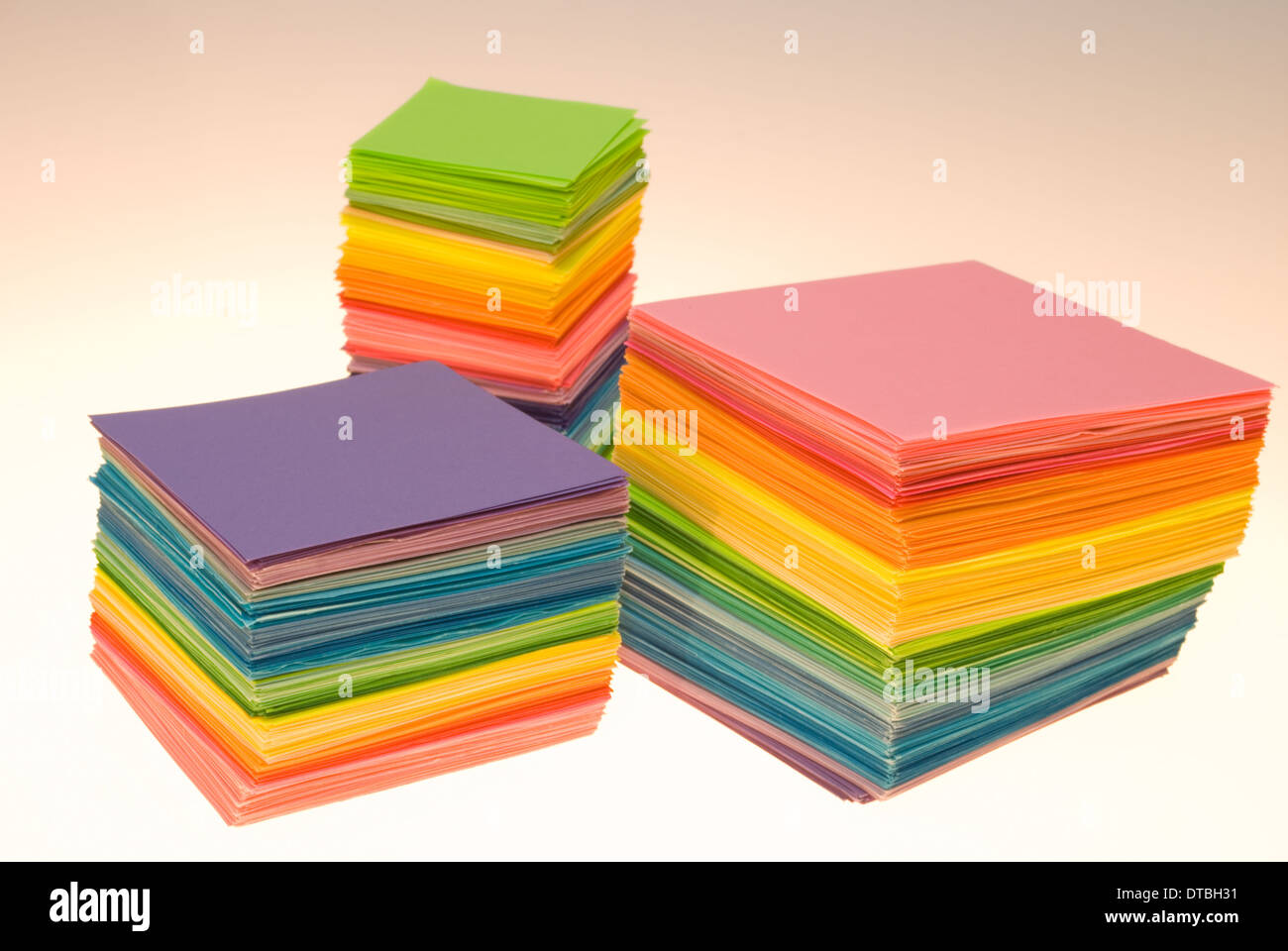 Various color shits of paper scattered on white background Stock Photo ...