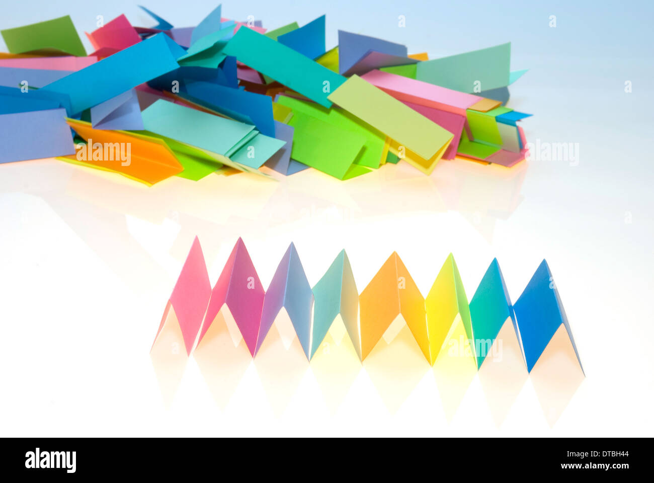 Various color shits of paper scattered on white background Stock Photo ...