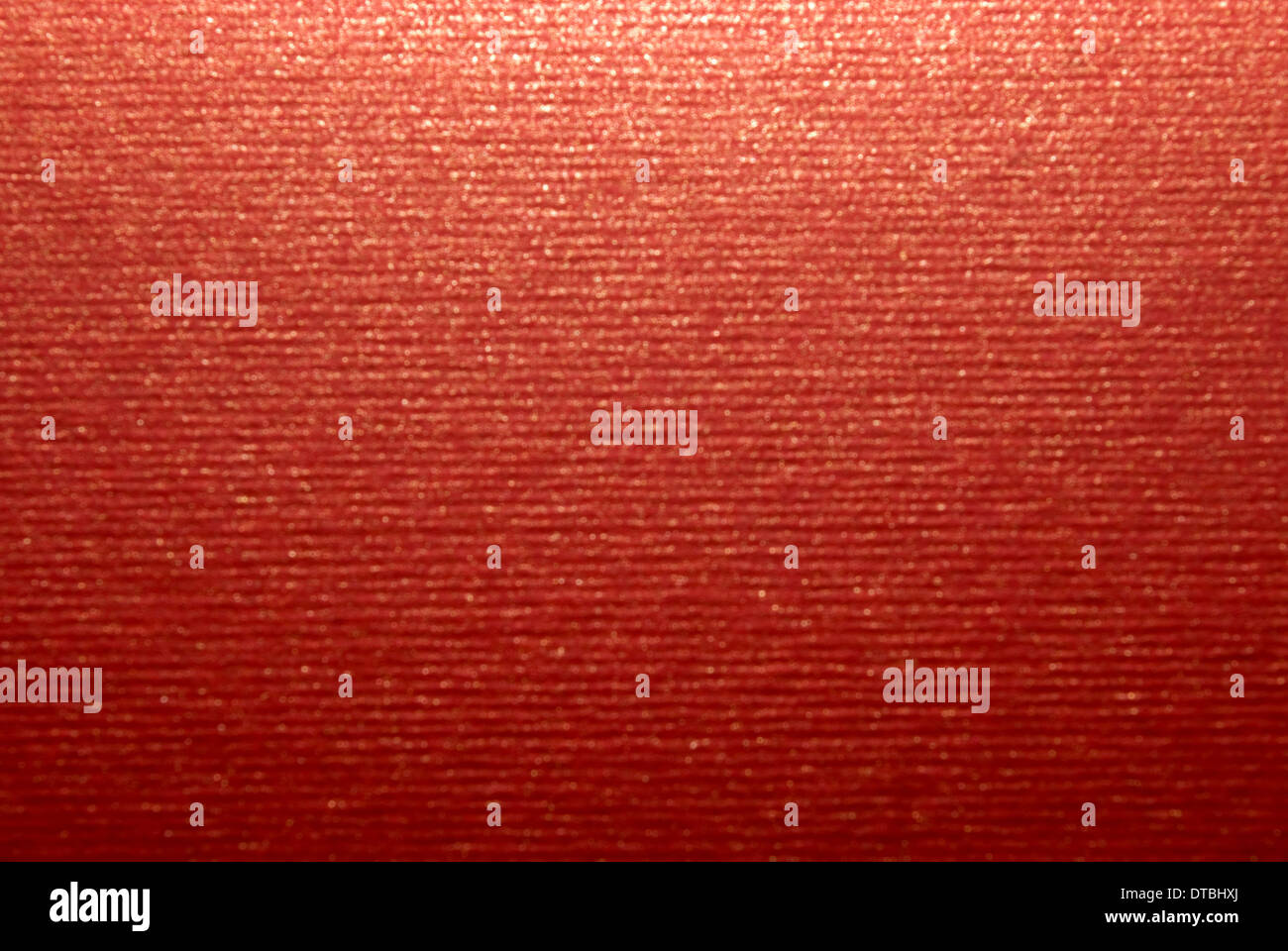 Textured red paper with gold shine Stock Photo - Alamy