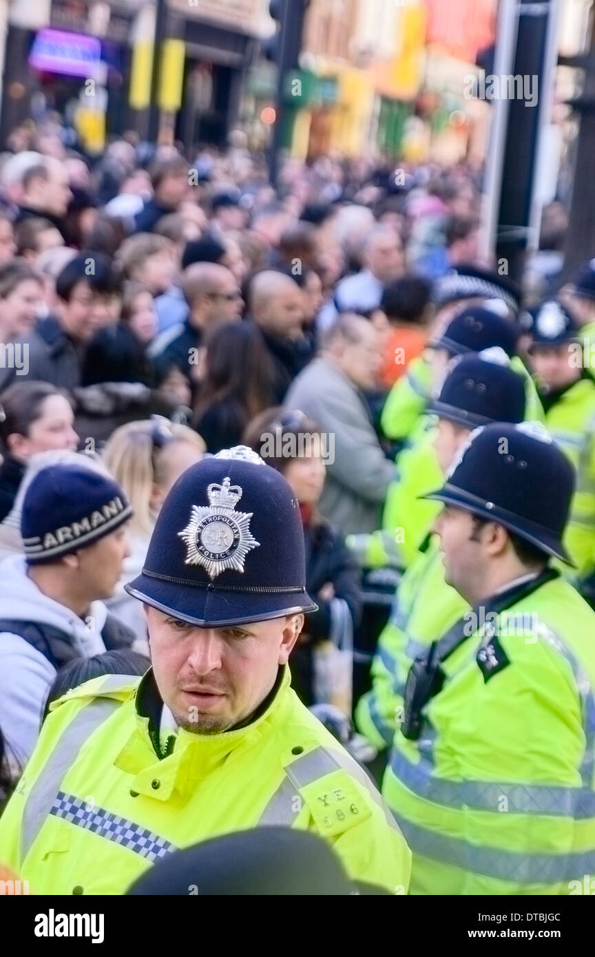 Group of British policemen restraining crowd during Chinese New Year in ...