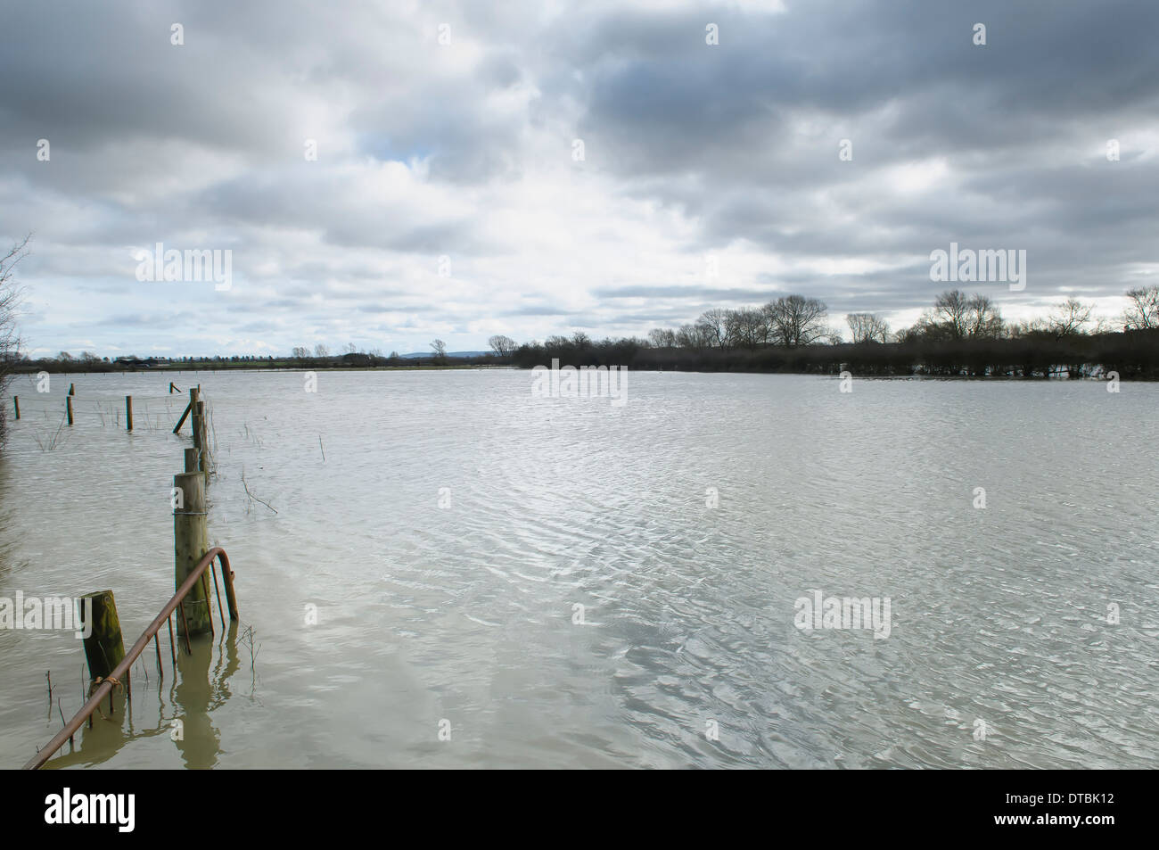 Flooded field fields with farmland and fences underwater trees ...