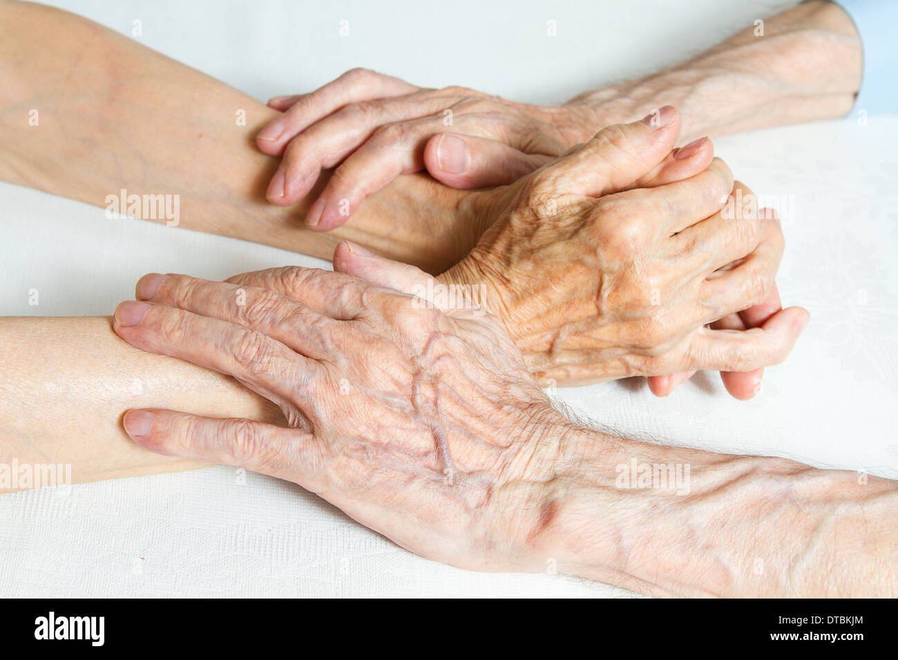 Old people holding hands. Closeup Stock Photo - Alamy
