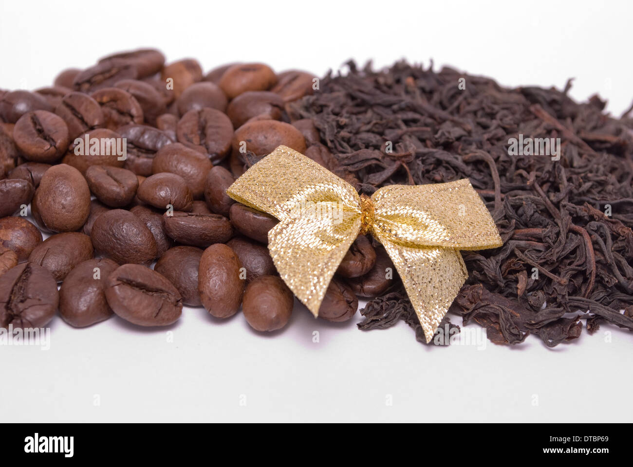 Coffee beans and tea leafs isolated Stock Photo - Alamy