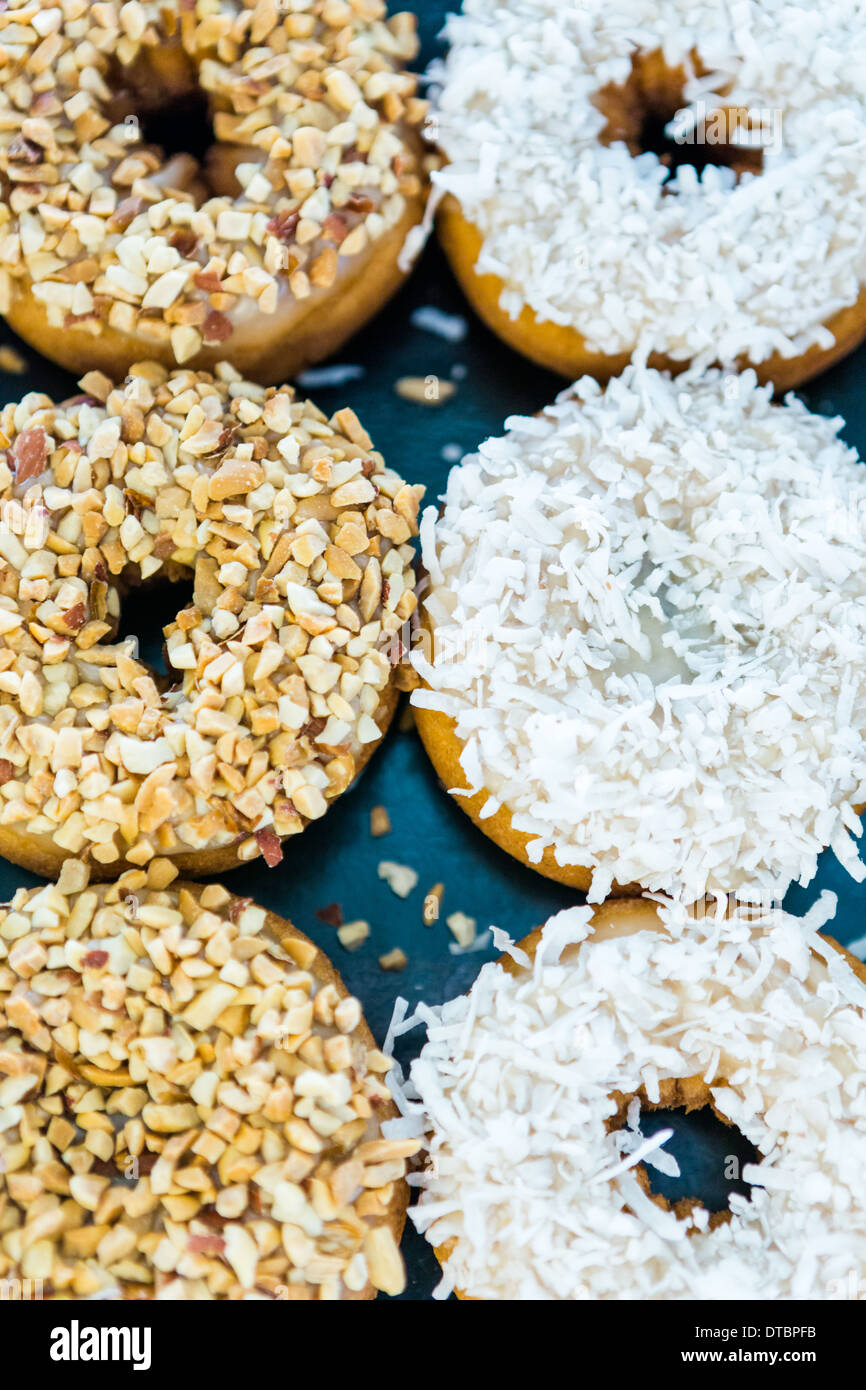 Fresh donuts with different toppings from the local bakery shop Stock ...