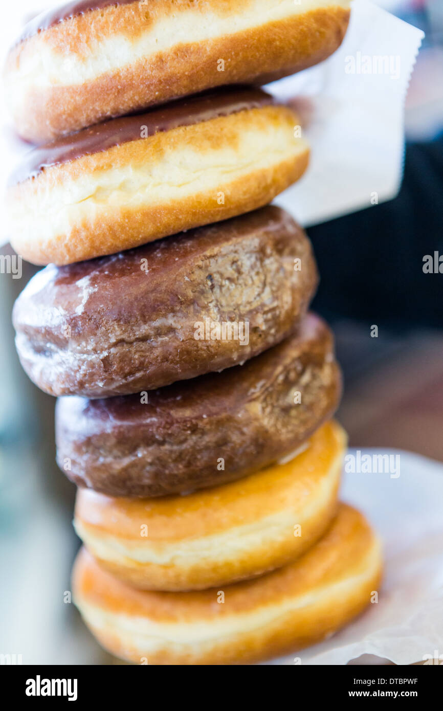 Stack of fresh donuts from the local bakery shop Stock Photo - Alamy