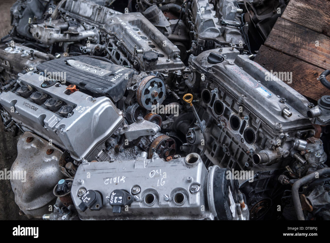 Engines in a scrap yard UK Stock Photo - Alamy
