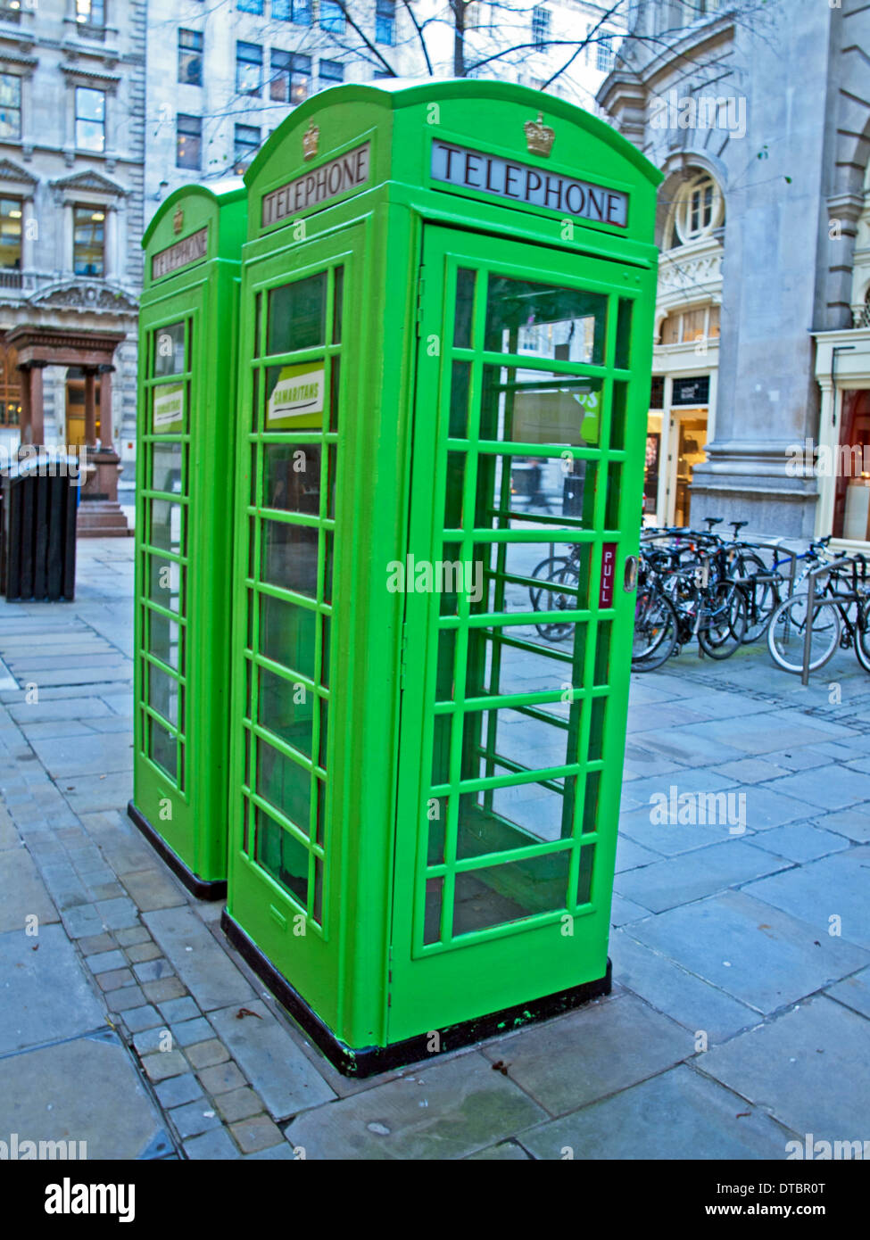 Traditional red telephone boxes painted green to celebrate Samaritans ...