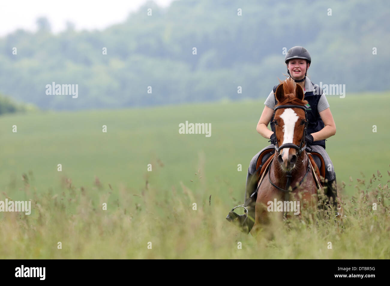 Woman doing horse ride hi-res stock photography and images - Alamy