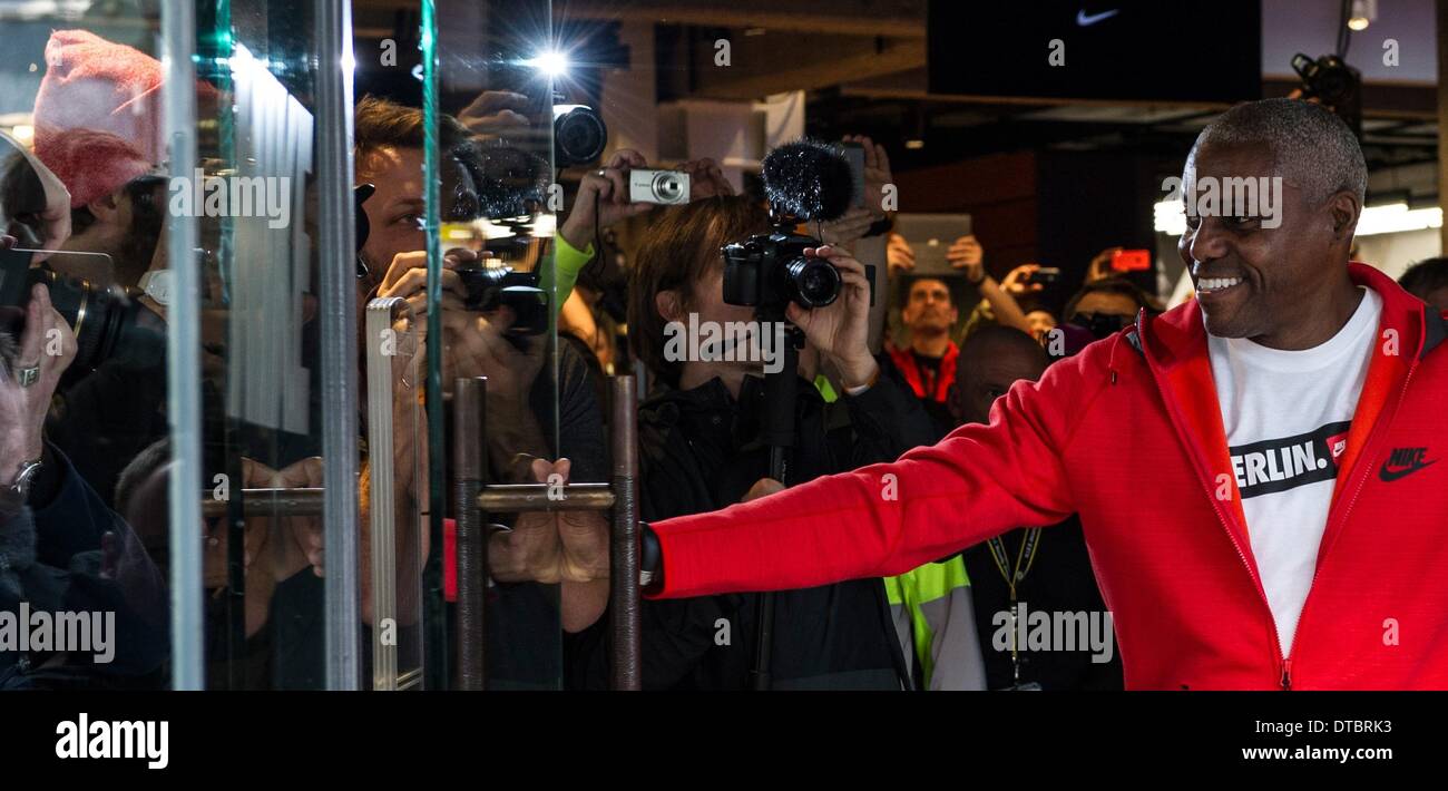 Former US athlete Carl Lewis symbolically opens the new Nike Store in ...